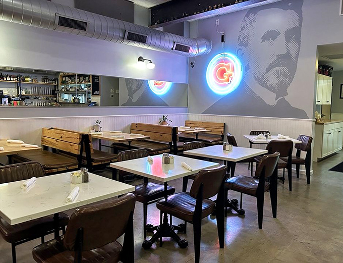 The dining area's wooden booths and artful wall mural create that perfect "third place" between home and work where memories get made.