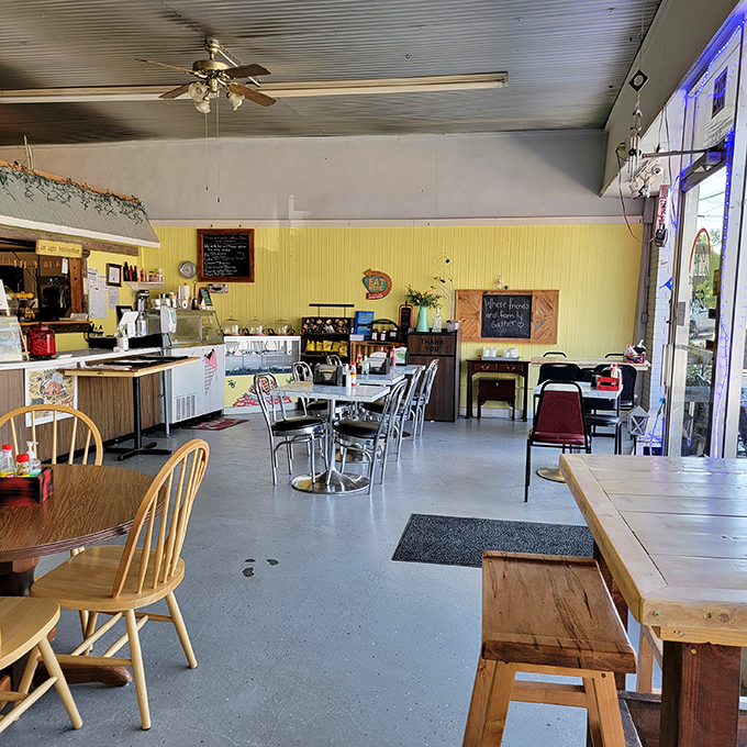 No designer lighting or trendy decor here&mdash;just honest wooden tables, metal chairs, and a space that says "stay awhile" without having to try too hard.