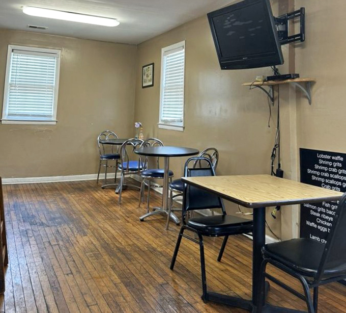 Wooden floors worn smooth by decades of happy feet, tables waiting for the next round of food-induced joy to begin.