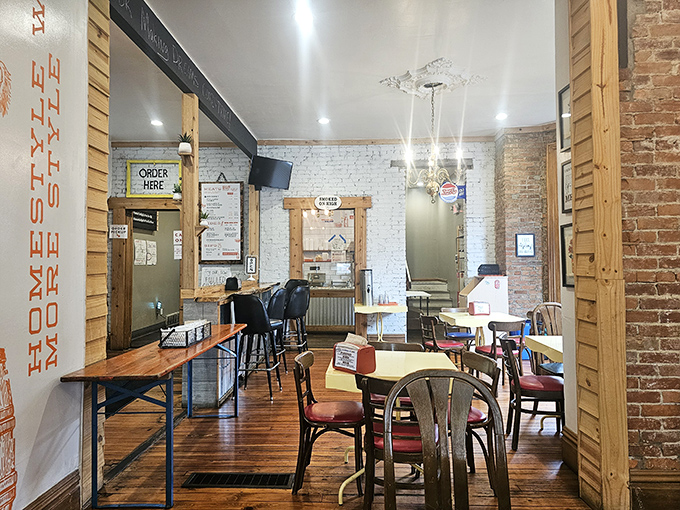 Simple tables, wooden floors, and brick walls&mdash;because great barbecue doesn't need fancy surroundings to shine.