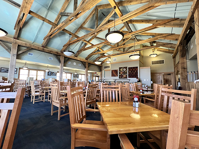 Rustic elegance defines this dining space where wooden beams create cathedral-like architecture for worshipping good food.
