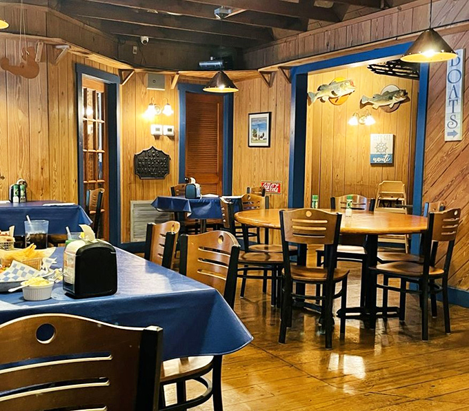 Blue tablecloths against honey-colored wood paneling&mdash;like dining inside a ship's cabin, minus the seasickness and with better food.