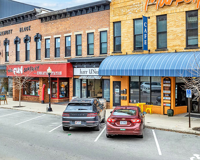 Colorful awnings and classic storefronts create the quintessential Midwest main street. Shopping local never looked so inviting.