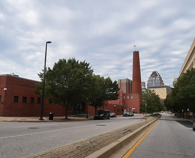 The tower plays a game of "one of these things is not like the others" with Baltimore's modern skyline. Spoiler alert: the brick cylinder wins.