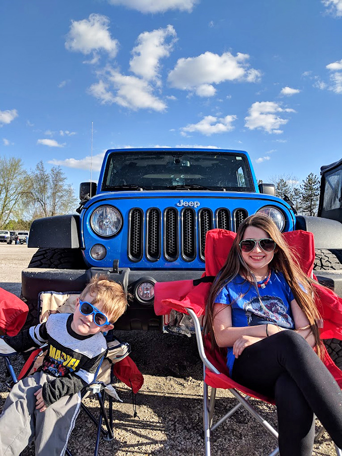 The ultimate outdoor theater experience&mdash;lawn chairs in front of a Jeep, sunglasses on, waiting for dusk to bring the screen to life.