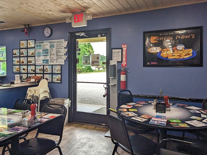 The entrance promises no frills but delivers all thrills. That "Fish Fry-day" sign speaks the universal language of comfort.