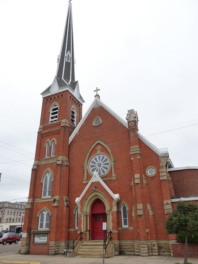 This red-brick Gothic revival church reaches skyward with its dramatic spire, a spiritual landmark that's been gathering the faithful since Portsmouth's early days.