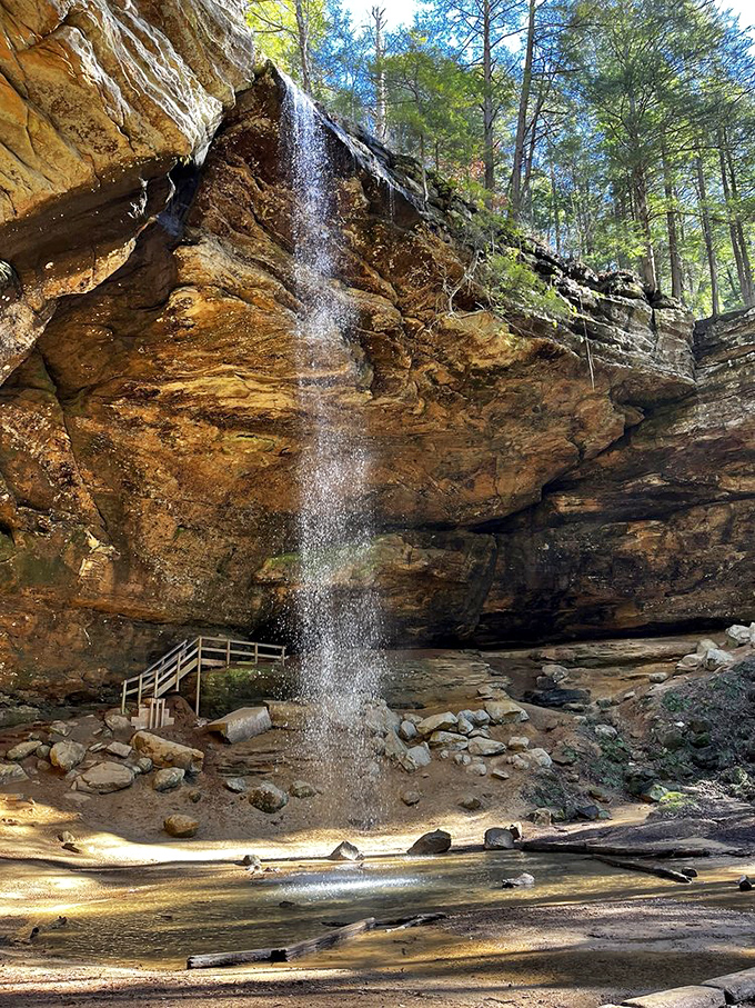 Water meets ancient stone in a delicate curtain of spray. Stand here long enough and you'll understand why people become nature photographers.