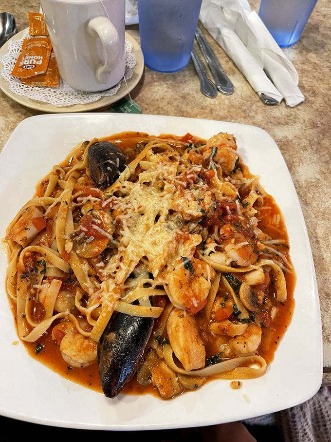 Seafood fettuccine that doesn't skimp on the ocean's bounty. Those mussels aren't just for show &ndash; they're flavor bombs waiting to happen.