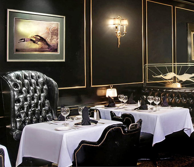 Not just tables and chairs, but a theater where culinary drama unfolds nightly. Those tufted leather seats have witnessed countless "mmm" moments.