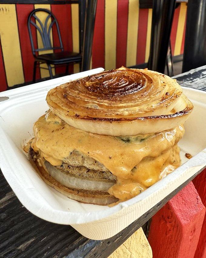 The Flying Dutch Turkey burger defies gravity and good sense with its towering construction of savory goodness between two grilled onions.