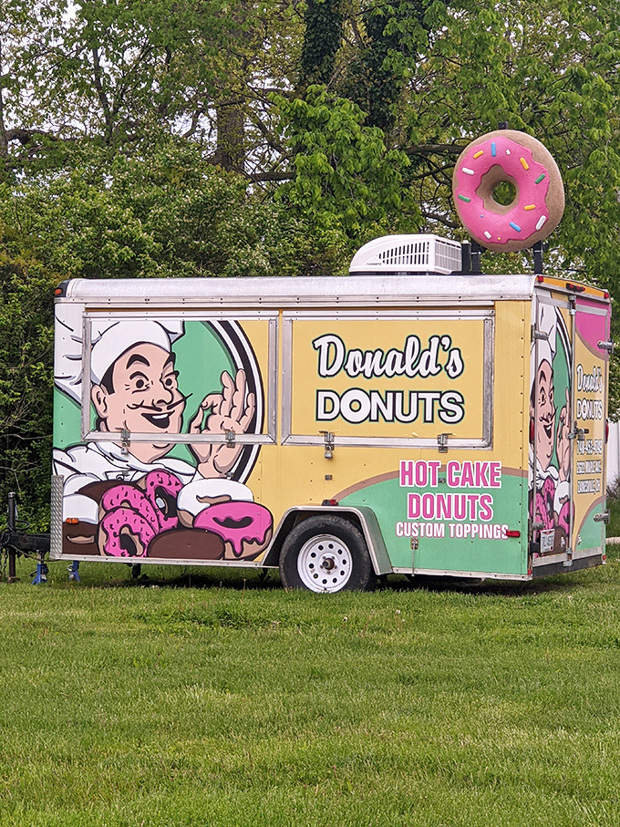 The Donald's Donuts food truck&mdash;spreading fried dough happiness on wheels, with that giant pink donut standing guard on top.
