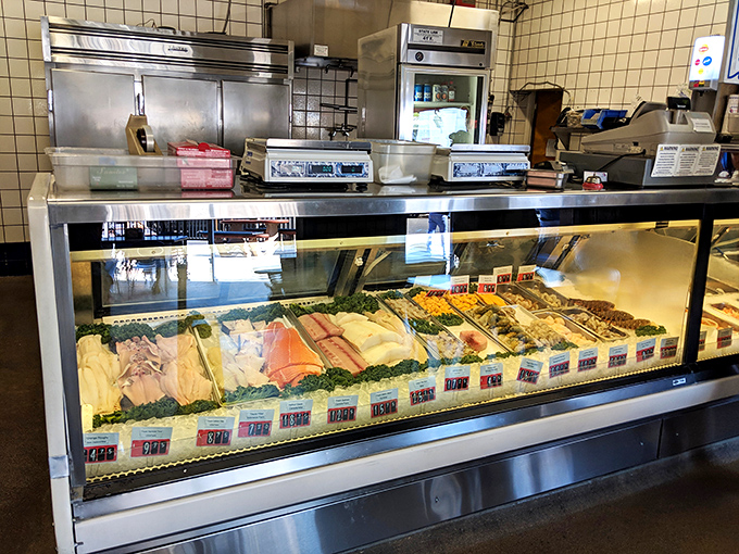 The aquatic version of a candy store for grown-ups. Fisherman's Outlet's fresh seafood counter displays ocean treasures ready for your selection.