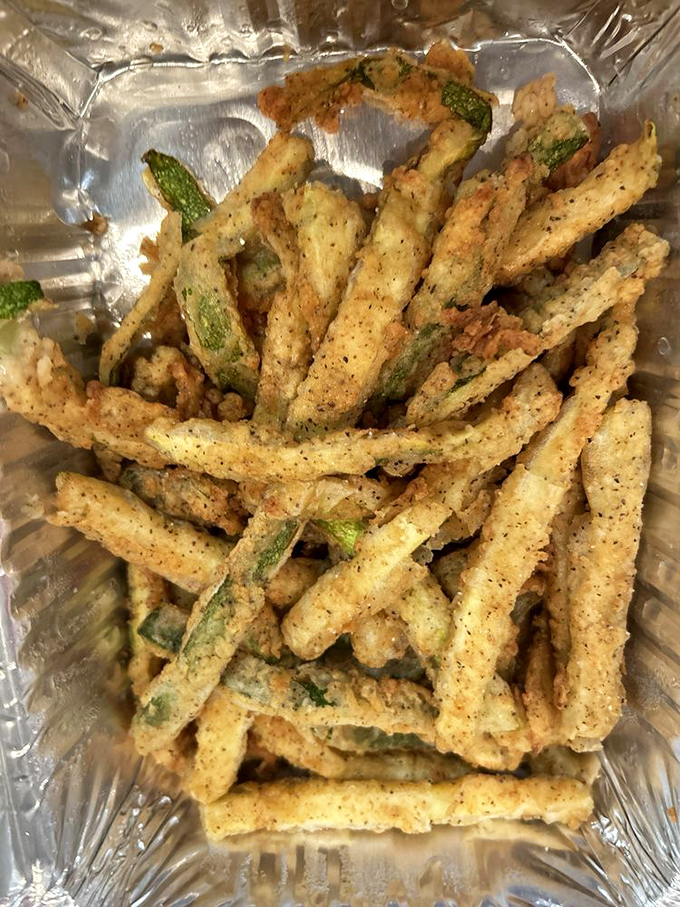 Crispy zucchini fries that could convert even the most dedicated vegetable-avoider. The perfect balance of crunch and tenderness in every golden strip.