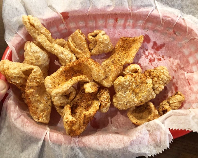 Fried pork skins dusted with seasoning that shatter with each bite. The ultimate low-carb indulgence that pairs perfectly with cold beer.