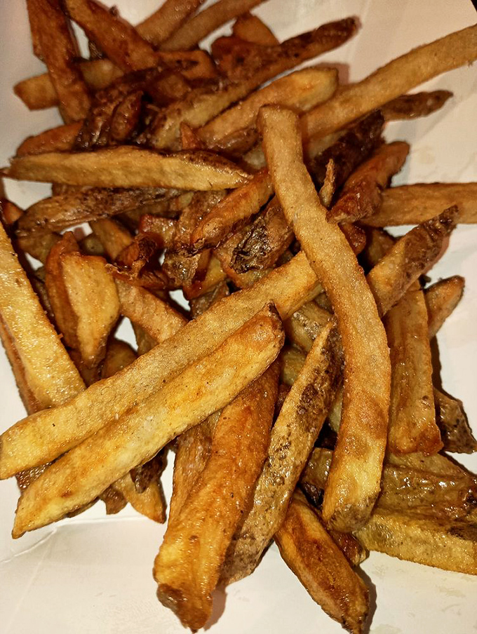 Hand-cut fries with personality&mdash;some crispy, some soft, all delicious. The kind that make you fight over the last one at the table.