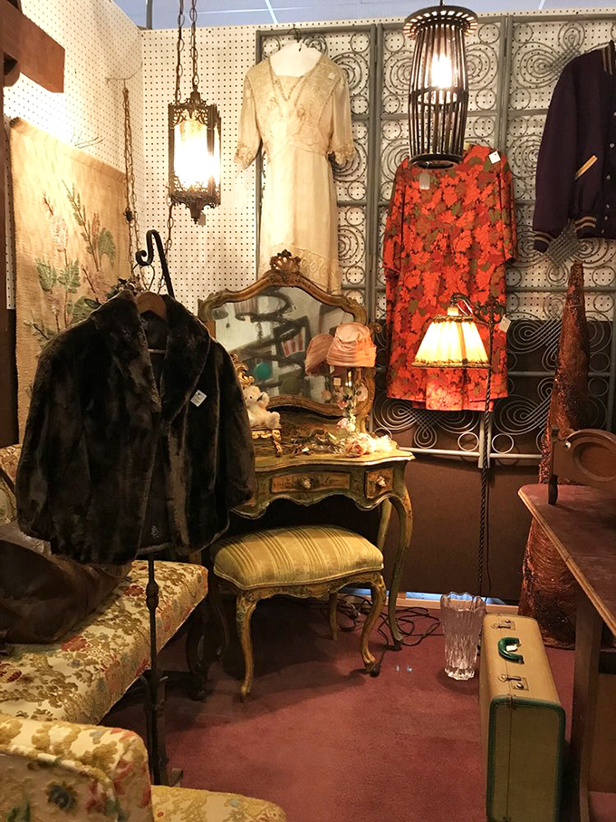 A vintage vanity staged with period-perfect accessories creates a glamorous vignette that would make Golden Age Hollywood starlets feel right at home.