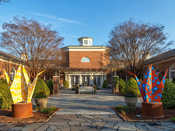 The Education Center welcomes visitors with artistic flame sculptures that seem to say, "Yes, gardens can be both elegant AND fun."