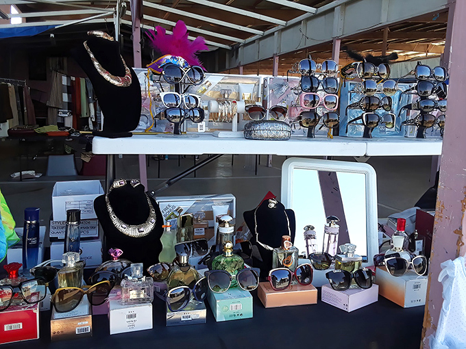 Sunglasses and perfume bottles create a glamour section where swap meet shoppers can upgrade their style without downgrading their bank accounts.