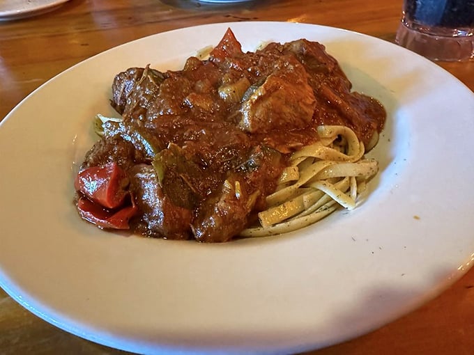 This hearty goulash, with tender chunks of beef swimming in rich gravy atop homemade noodles, is the kind of dish that makes winter almost welcome.