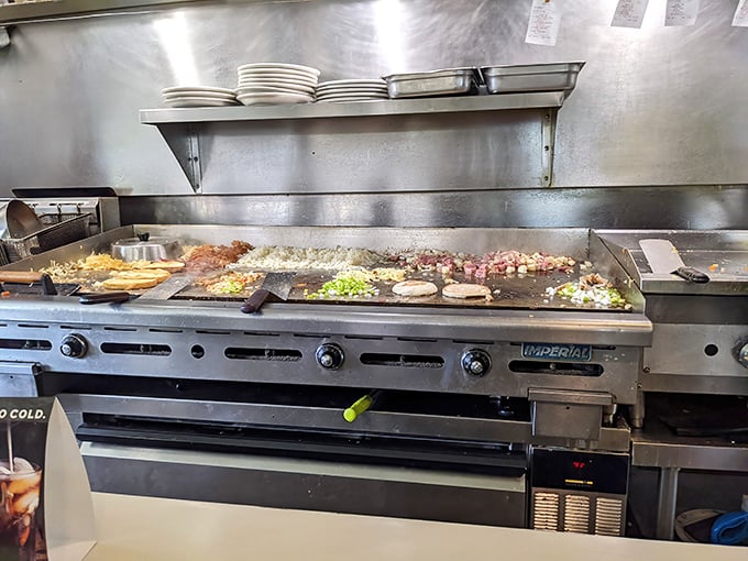 Where the magic happens! This isn't just a grill&mdash;it's a stage where breakfast performers have perfected their craft over decades.