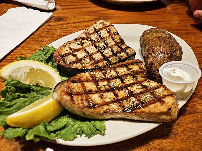 Grilled salmon with perfect crosshatch marks that would make a geometry teacher proud. Proof that Bynum's isn't just about beef.