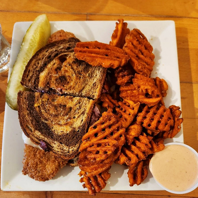 A sandwich that bridges the gap between comfort and sophistication. Perfectly grilled bread cradles what might be the world's most perfect comfort food marriage.