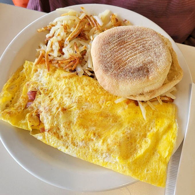 An omelet that's seen things&mdash;specifically, the perfect amount of ham and cheese folded into eggs by hands that have made thousands just like it.