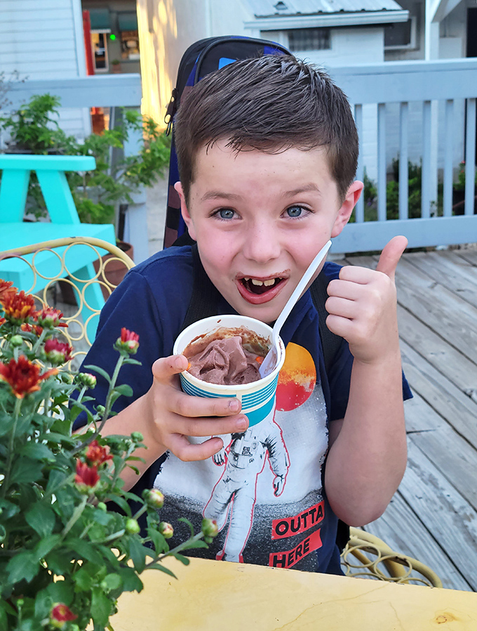 The universal language of ice cream joy. That thumbs-up says what we're all thinking: life is better with gelato.