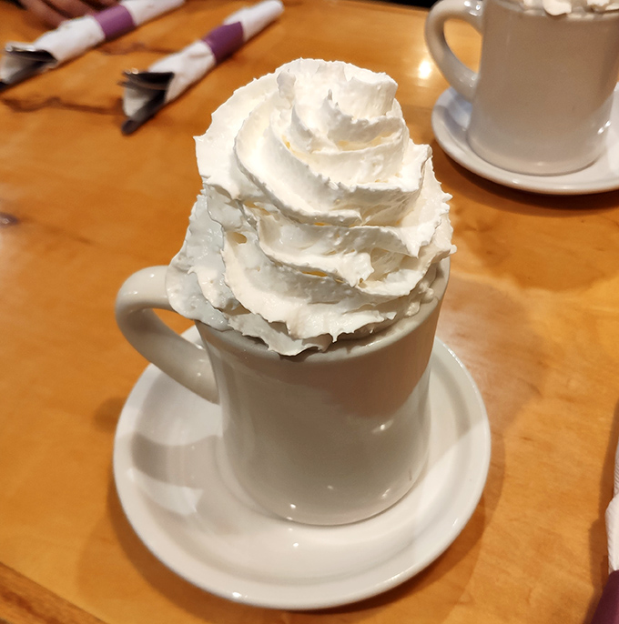 Hot chocolate that's more whipped cream than beverage &ndash; exactly as it should be. Winter comfort in a mug, no matter the season.
