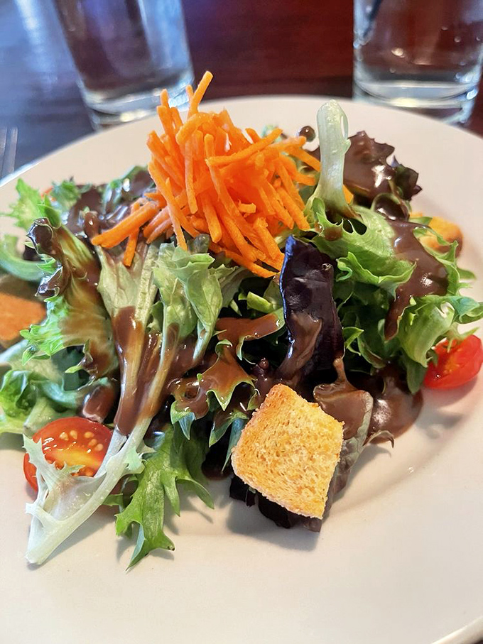 Even the house salad gets the star treatment &ndash; fresh greens, vibrant carrots, and a crouton that didn't come from a box.