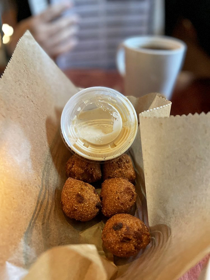 Hush puppies that actually make you want to hush up and focus on eating. These golden-fried treasures are the unsung heroes of Southern cuisine.