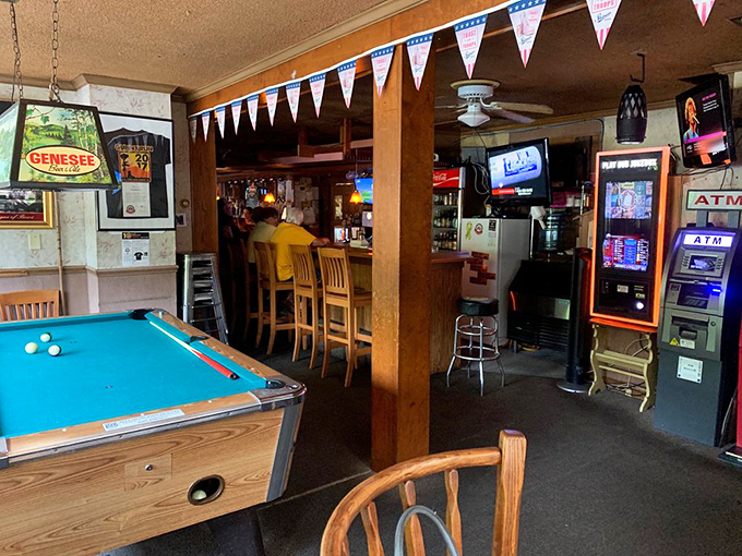 Where billiards meets beverages—a corner of the tavern that's seen its fair share of friendly competition and "just one more" rounds.