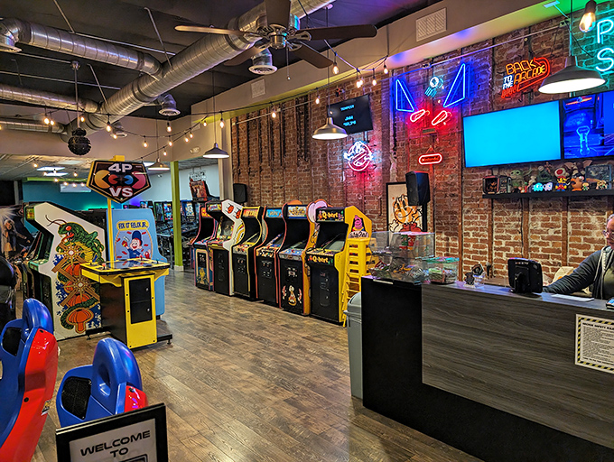 The neon "PRESS START" sign isn't just decoration&mdash;it's practically a philosophical statement about embracing joy whenever possible.