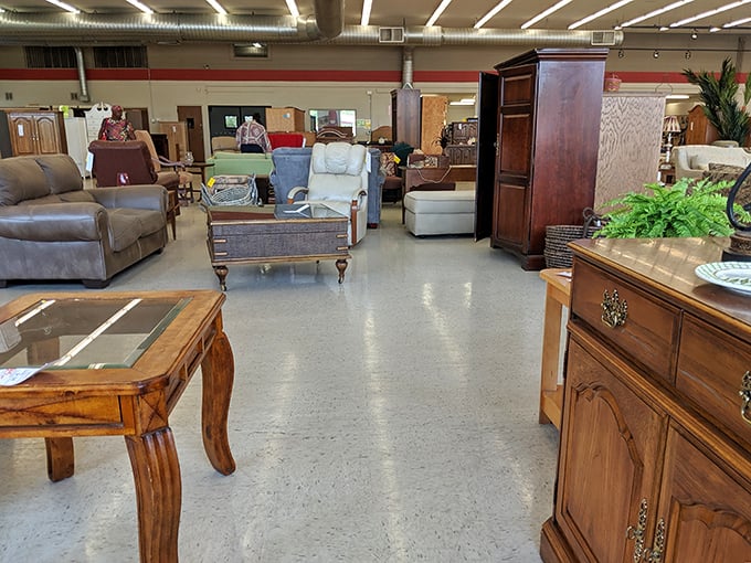 Living room landscape! Navigate through islands of coffee tables, sofas, and accent pieces in this well-organized furniture archipelago.