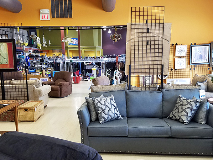 The furniture showroom could double as a living room staging area for "Comfortable Homes of the Midwest"&mdash;complete with throw pillows that actually match.