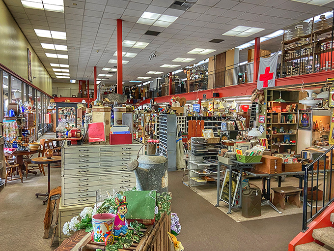 Two floors of organized chaos where treasures hide in plain sight. The red pillars stand like sentinels guarding decades of American material culture.