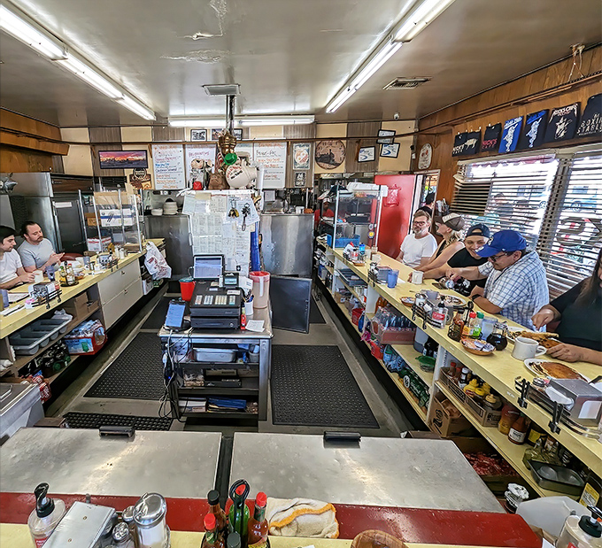 The horseshoe counter isn't just efficient design&mdash;it's community architecture where strangers become temporary breakfast companions.