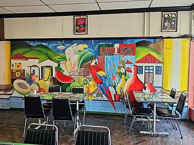 The vibrant mural transforms an ordinary wall into a Mexican landscape. Even the furniture seems to be enjoying the view.