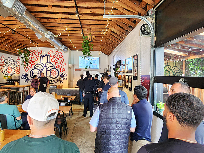 The line forms early at Moo's, where patient barbecue pilgrims gather beneath the wooden beams, knowing that good things come to those who wait.