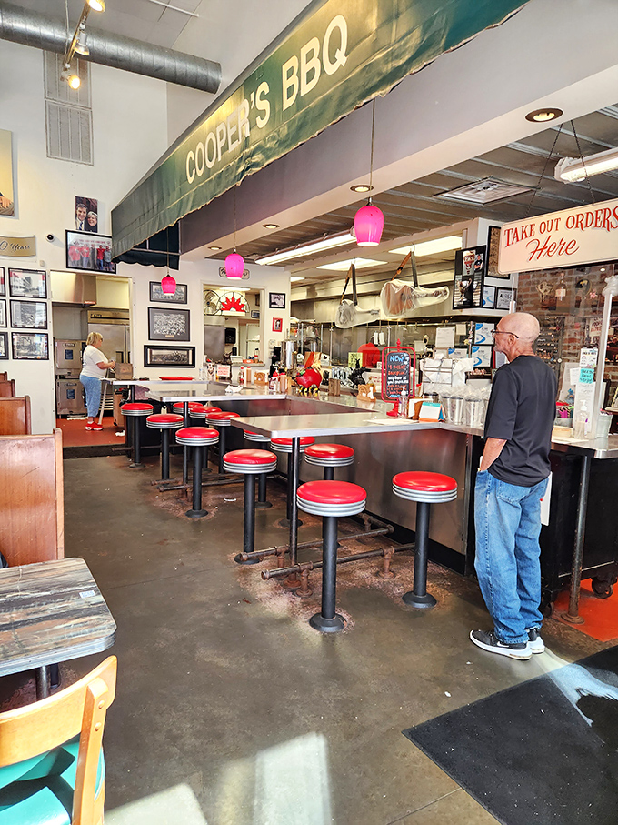 The counter service setup where barbecue dreams come true. Those pink pendant lights have illuminated countless "first bite" expressions of joy.