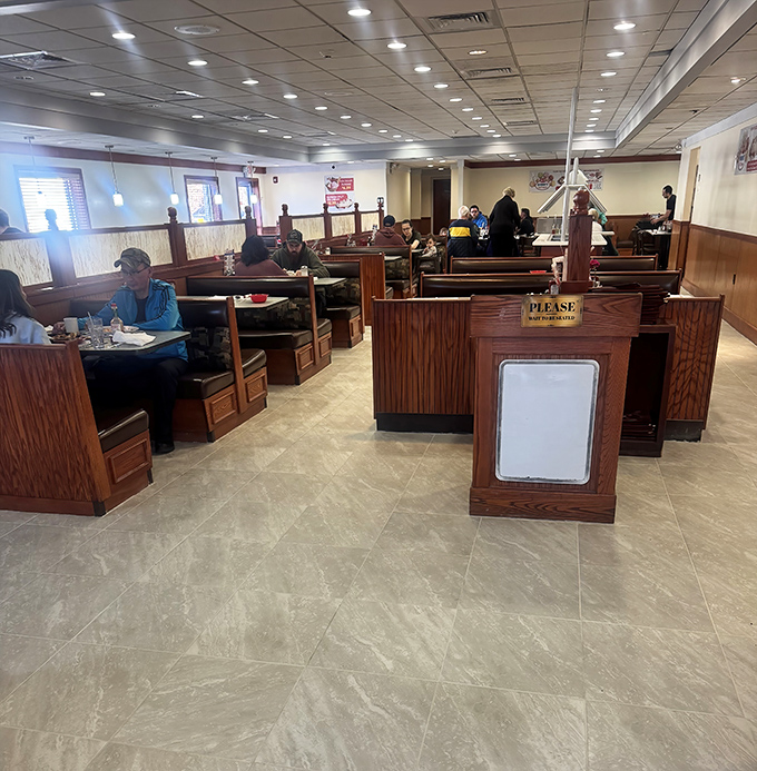 Spacious booths invite lingering conversations over coffee that never seems to run completely empty.