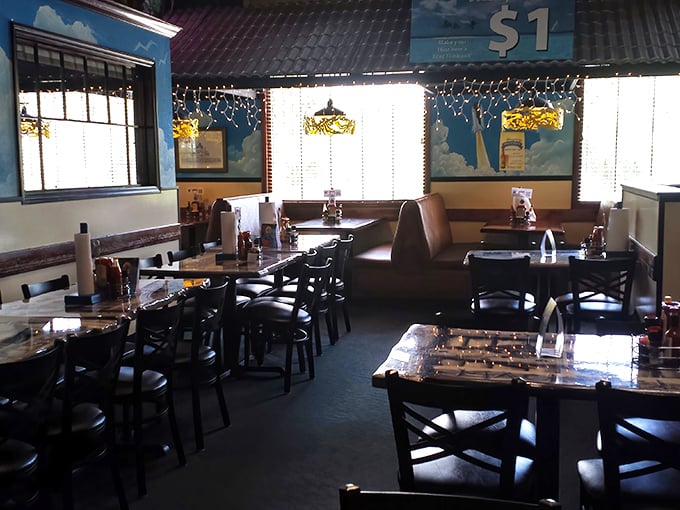 The dining room balances family-friendly comfort with maritime charm&mdash;string lights overhead creating the perfect atmosphere for seafood feasting.