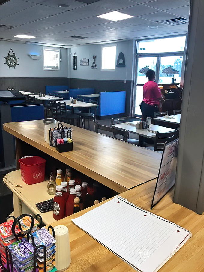 The counter service view&mdash;where regulars become family and coffee refills appear like magic. Nautical touches remind you you're in coastal Florida.