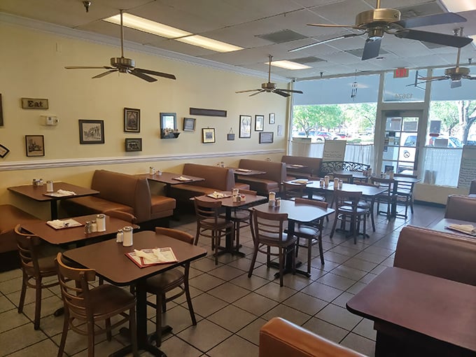 The dining room where strangers become neighbors, all united by the universal language of "mmm" and "pass the syrup."