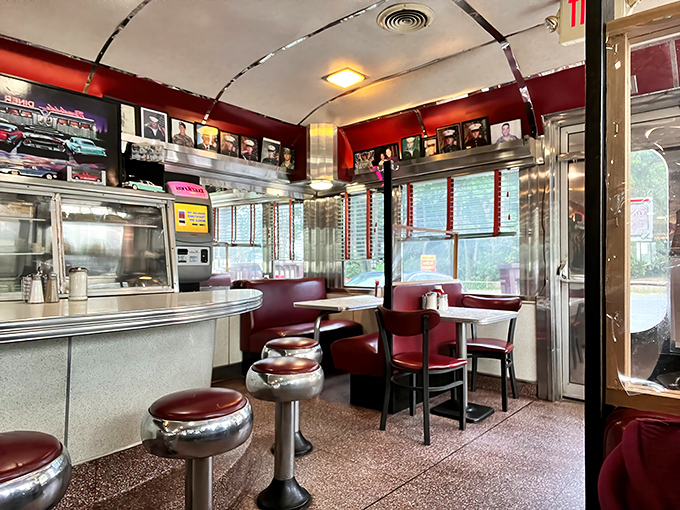 Red vinyl booths and chrome details create the perfect backdrop for memorable meals and moments.