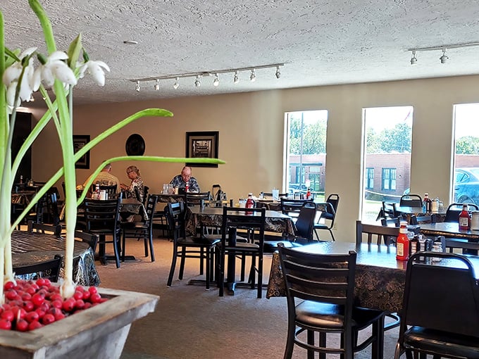 The dining room buzzes with conversation and the comfortable energy of a true community gathering place.