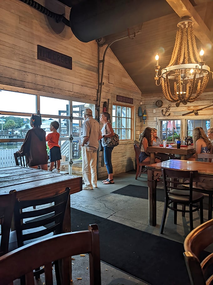 Rope chandeliers and weathered wood create the perfect backdrop for seafood stories that get better with each telling.