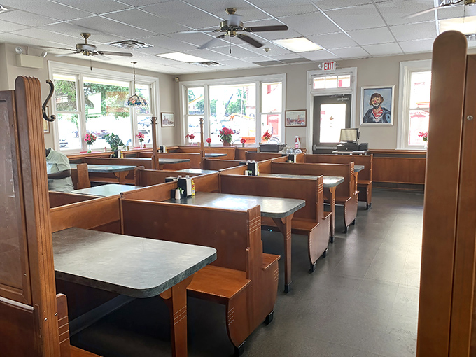 Empty booths waiting for stories to fill them—each table a stage where family dramas and celebrations have played out for decades.
