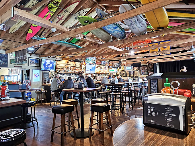Where surfboards meet spirits &ndash; a bar area where stories flow as freely as the local brews on tap.
